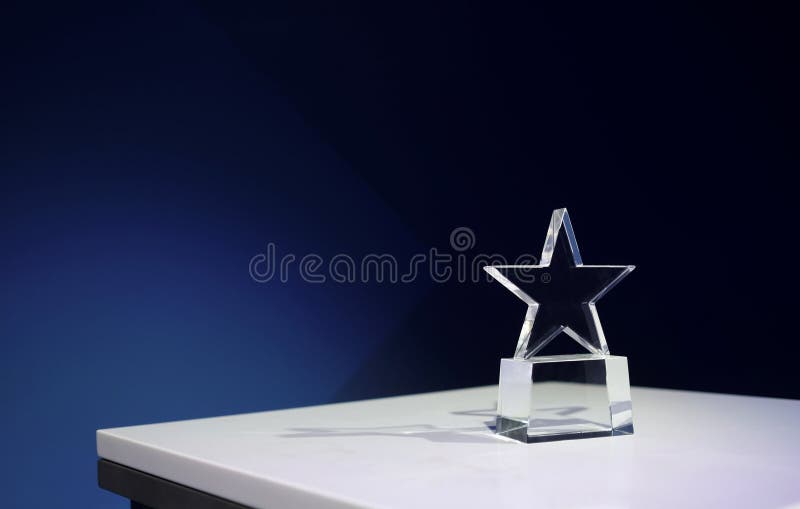 Star-shaped Award on a Table Stock Image - Image of copy, trophy: 308451067