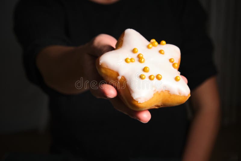 Star-shaped Doughnut in a Woman& X27;s Hand Stock Photo - Image of ...