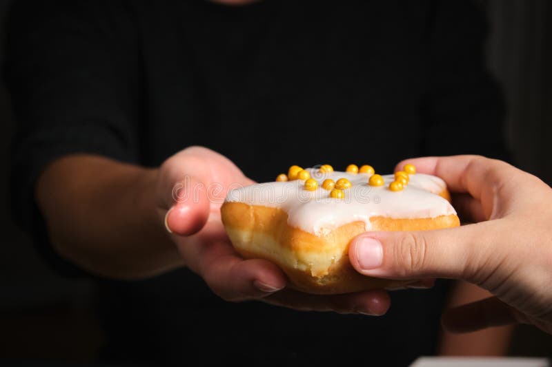 Star-shaped Doughnut in a Woman& X27;s Hand Stock Photo - Image of ...