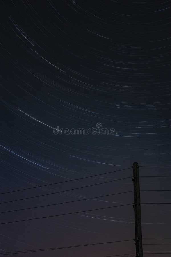 Star Tracks in the Dark Sky Stock Photo - Image of cluster, coast ...