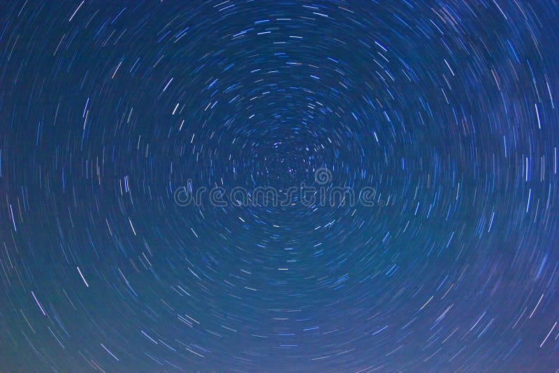 Star tracks on a night sky stock image. Image of night - 25412327