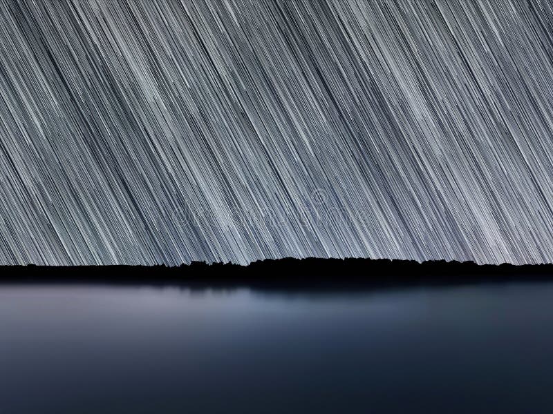 Star Trails, Beautiful Blue Night Reflection Stock Photo - Image of ...