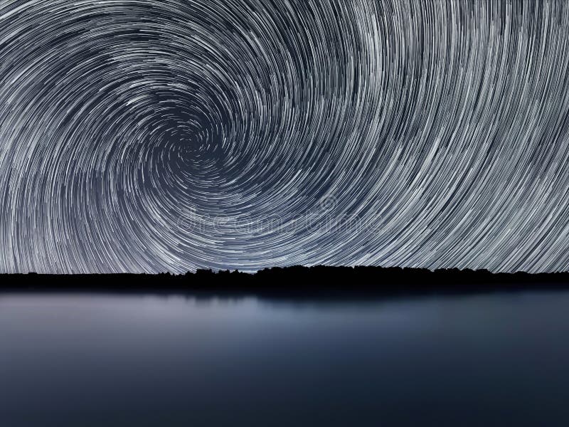 Star Trails, Beautiful Blue Night Reflection Stock Image - Image of ...