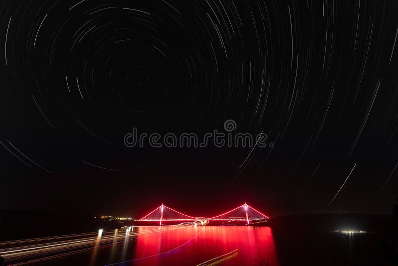Star Trails over Bridge stock image. Image of stars - 373436533