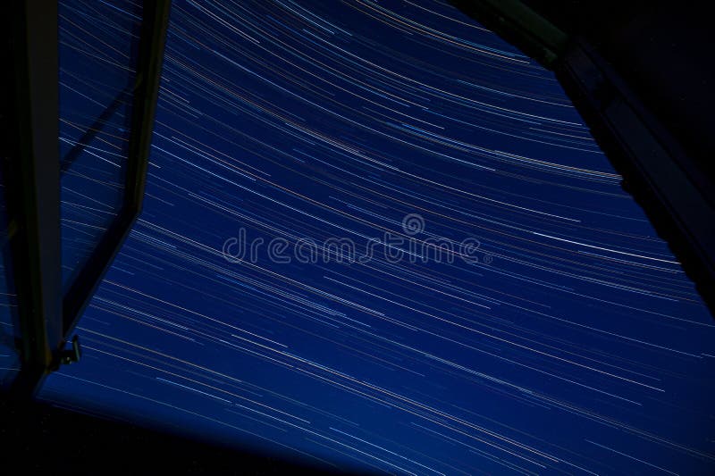Star Trails through a Window Looking South Stock Photo - Image of ...