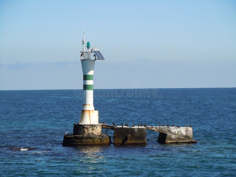 Isolated Starboard Light Beacon on Rock Stock Photo - Image of white ...