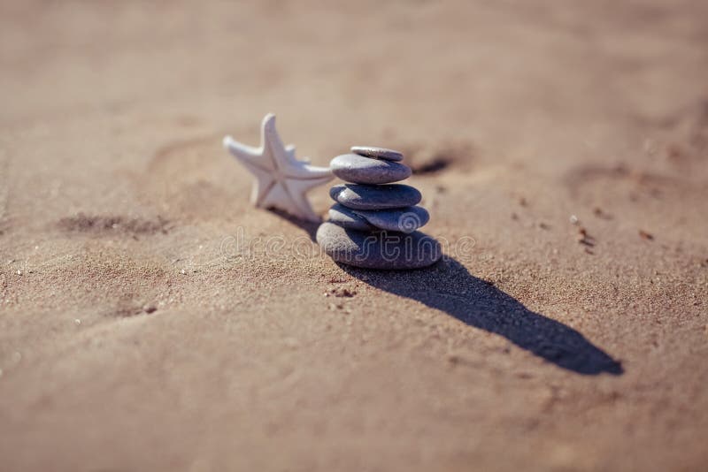 Starfish and Stack of Pebbles at the Beach Stock Photo - Image of peace ...