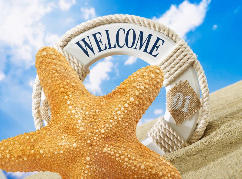 Starfish and Welcome Sign on Beach Stock Photo - Image of sunny ...