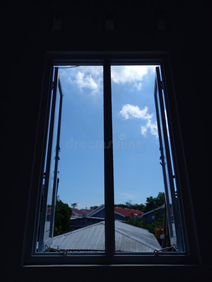 Staring at windows stock photo. Image of boarding, view - 262558086