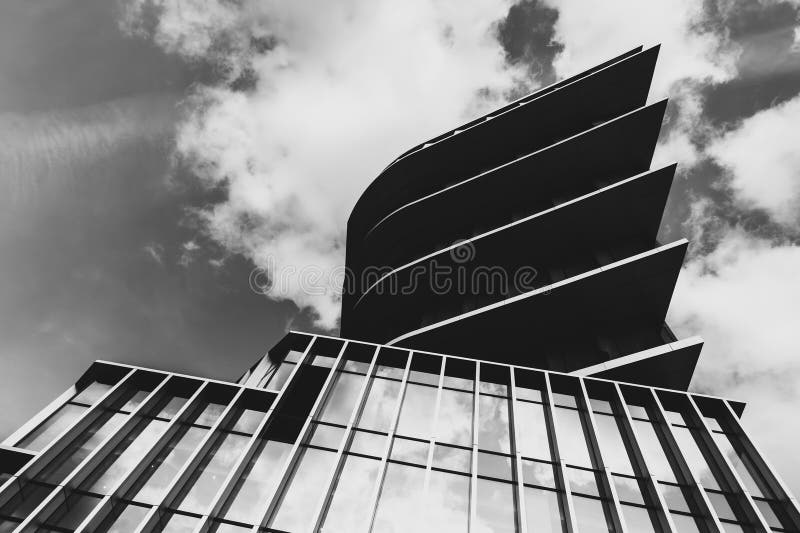 Stark Black and White Contrast of a Modern Building with Dynamic Sky ...