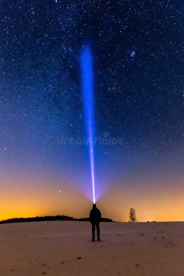 Starry Sky and Man with Flashlight. Winter Night Landscape Stock Image ...