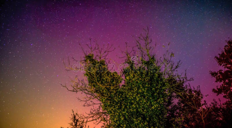 Stars with colored sky stock photo. Image of behinde - 49976744
