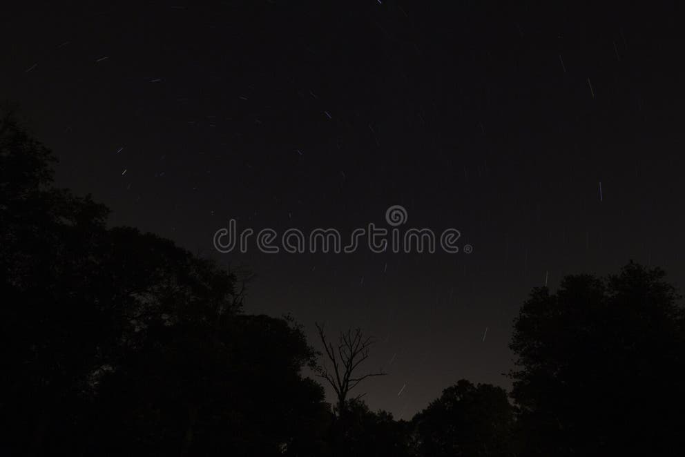 Stars Moving through the Night Sky Stock Photo - Image of stack, star ...