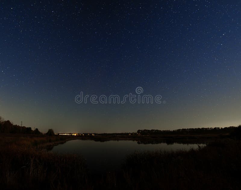 The Stars in the Night Sky. Night Landscape with a Smooth Surfac Stock ...