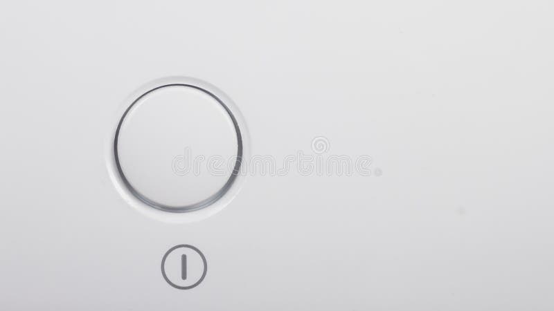 The Start Button, the on and Off Button of the Device on the White ...