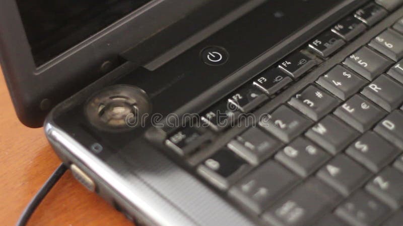 A Man Presses the Computer`s Power Button and the Computer Starts ...