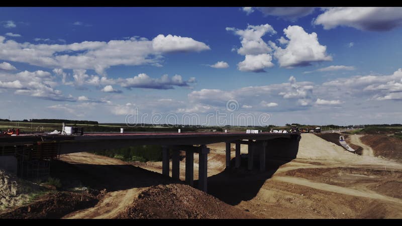 Construction of Overpass Bridge To Cross Main Highway Stock Footage ...
