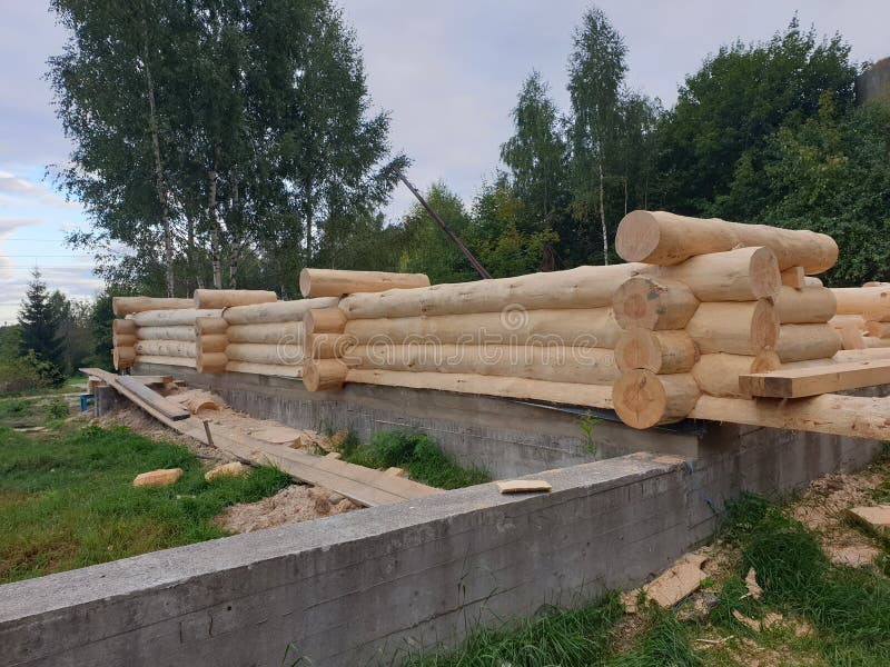 Start of Construction of a Wooden House Stock Photo - Image of logs ...