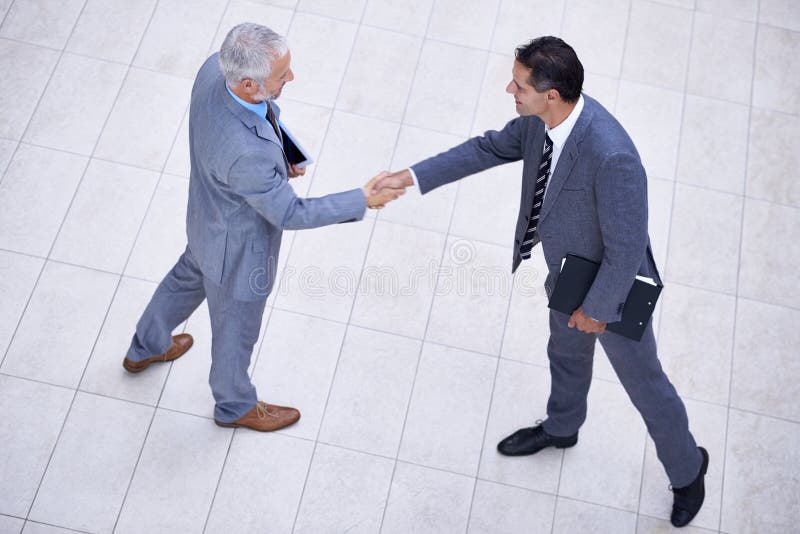 The Start of a Great Working Relationship. Budsiness People Shaking ...