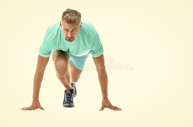 At the Start Line Runner Ready for Action, Copy Space. Runner Getting ...