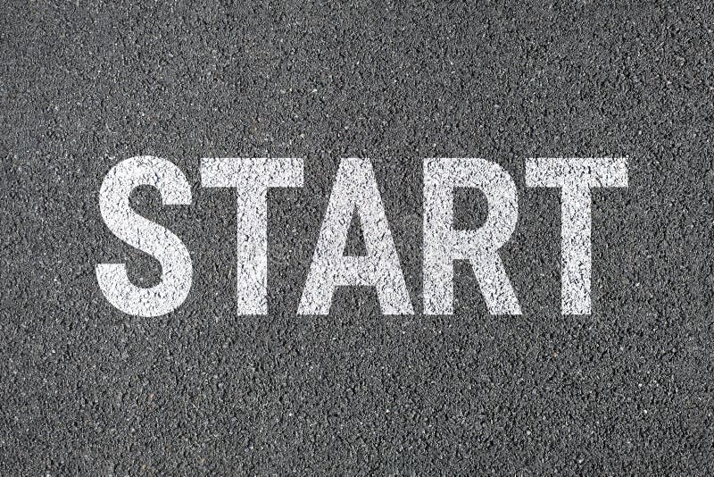 Start Sign on Road. Drawn with White Color Paint on Asphalt Stock Photo ...