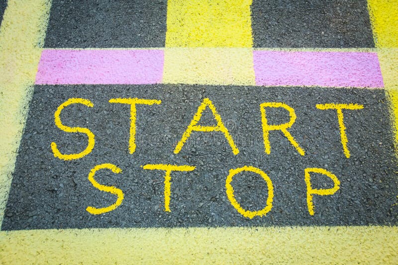 Start and Stop Sign on Road Stock Photo - Image of exercise, pink ...