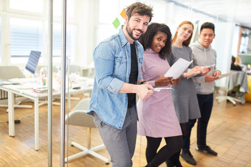 Start-up Team of a Design Agency with Trainees Stock Image - Image of ...