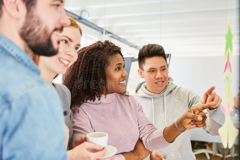 Start-up Team Discusses Creative Ideas Stock Photo - Image of graphic ...