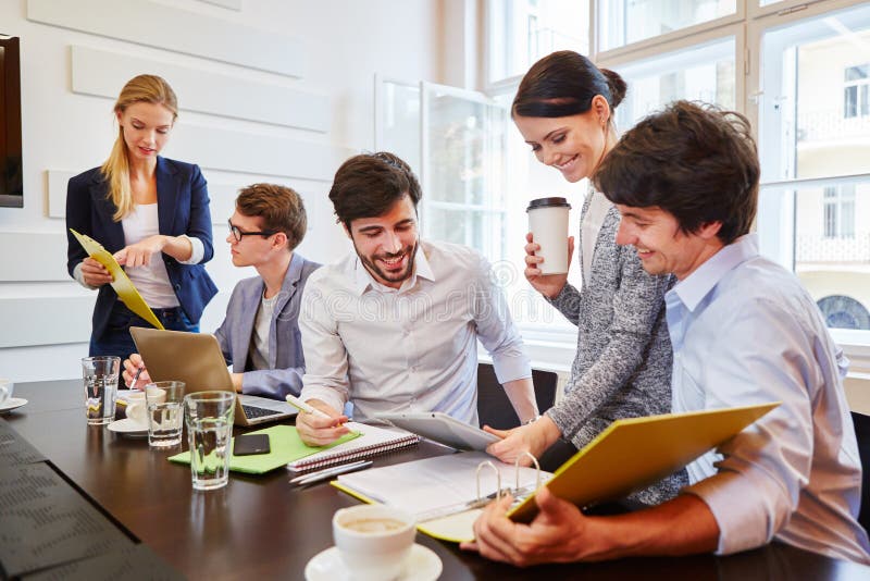 Start-up Team Discussing and Cooperating Stock Photo - Image of ...