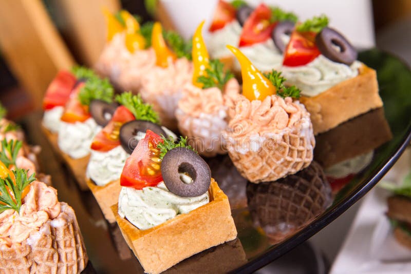 Canapes and other snacks stock image. Image of cooked - 157993637
