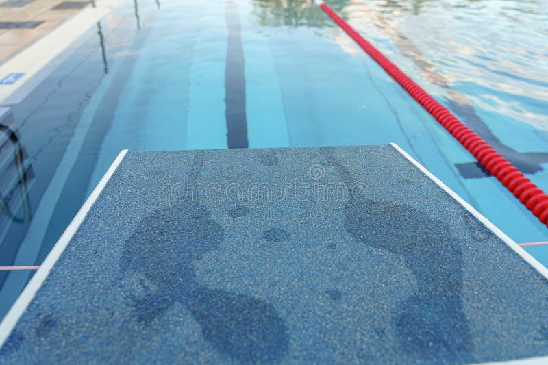 Starting Blocks for Diving into the Pool Stock Photo - Image of swim ...