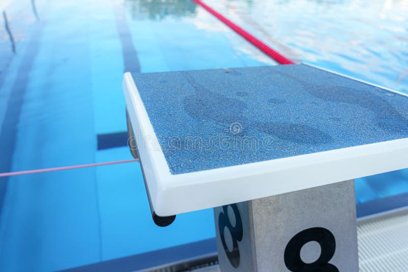 Starting Blocks for Diving into the Pool Stock Photo - Image of pool ...