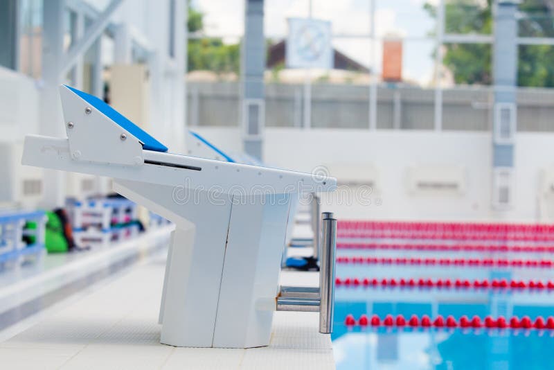 Starting Blocks and Lanes in a Swimming Pool Stock Photo - Image of ...