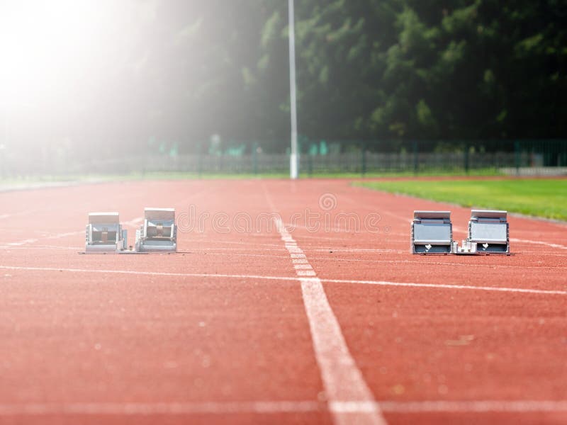 Starting Blocks on Red Running Tracks, Light Reflection an Lens Flare ...