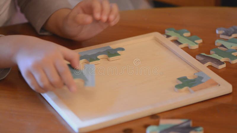 Starting a jigsaw puzzle stock video. Video of play, puzzle - 37189903