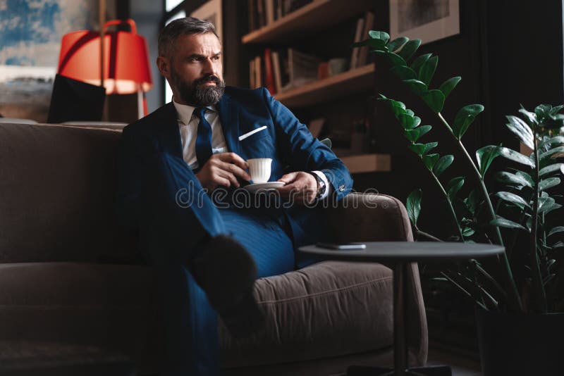 Starting New Working Day. Handsome Man Holding Coffee Cup Sitting on ...