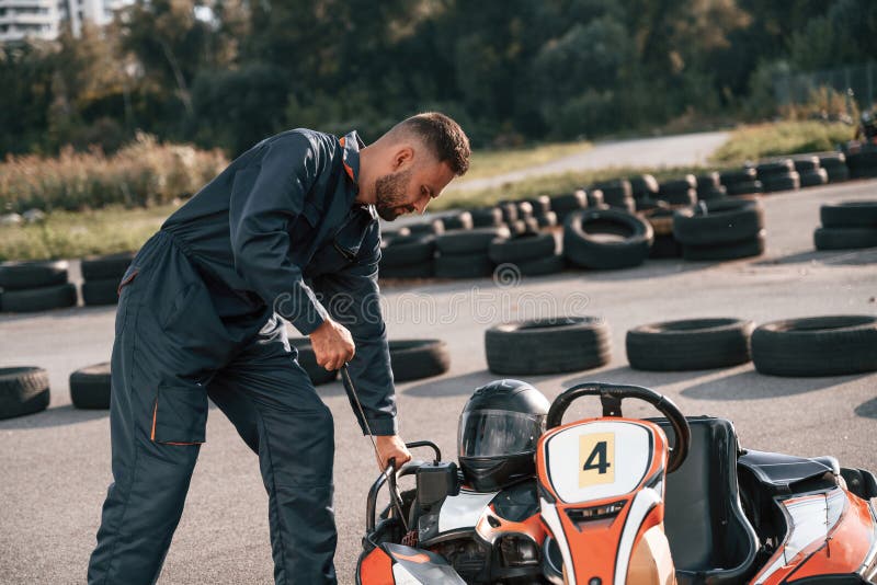 Starting the Vehicle. Man is Outdoors, Kart Racing Conception Stock Photo - Image of outdoors ...