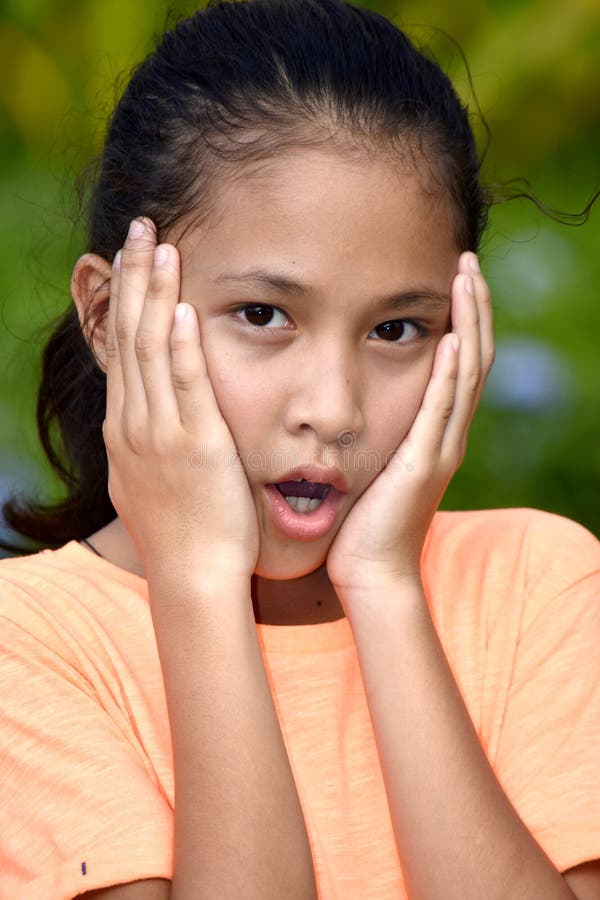 A Startled Girl Youth stock photo. Image of youth, youthful - 140666676