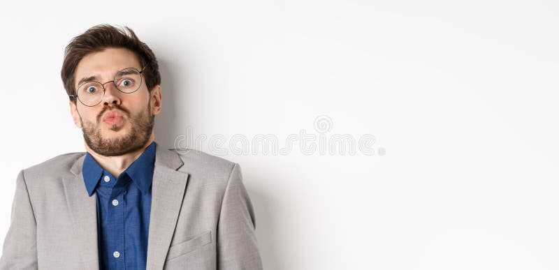 Startled Guy in Glasses and Suit, Tilt Back and Looking Shocked or ...