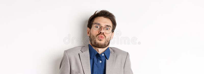 Startled Guy in Glasses and Suit, Tilt Back and Looking Shocked or ...