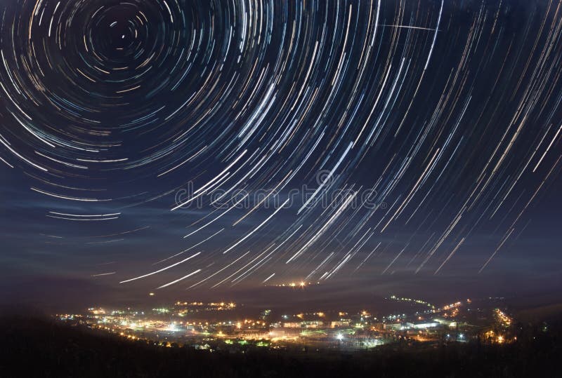 Startrails over the town stock image. Image of polaris - 96052967