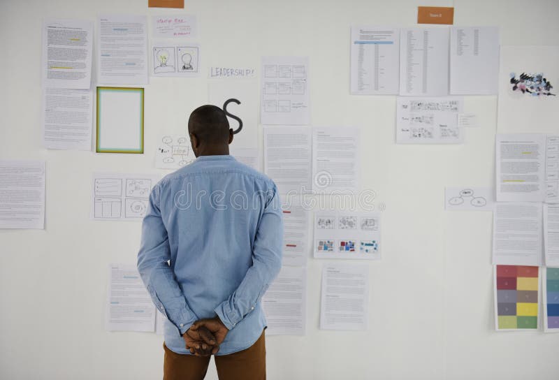 Startup Business People Looking on Strategy Board Information Th Stock ...
