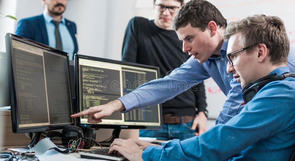 Startup Business Problem Solving. Software Developers Working on ...