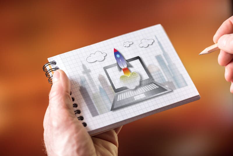 Startup Concept on a Notepad Stock Photo - Image of notepad, spaceship ...