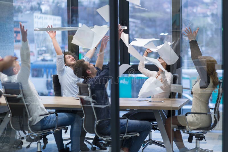 Startup Group of Young Business People Throwing Documents Stock Photo ...