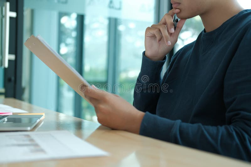 Male Freelancer Working with Document. Startup Man Analyzing Financial ...