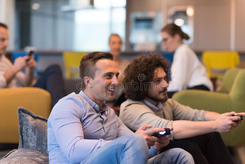 Startup Office Workers Playing Computer Games Stock Image - Image of ...