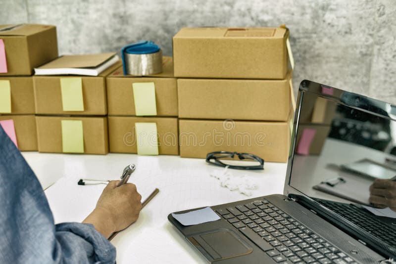 Startup Small Business Owner Writing Note. Man Seller Working at Stock ...