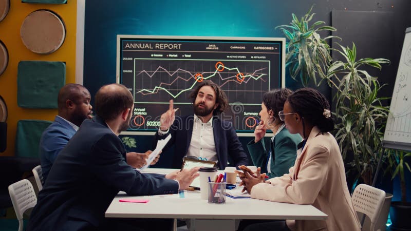 Startup Team Analyzing Success Metrics and Key Performance Indicators ...