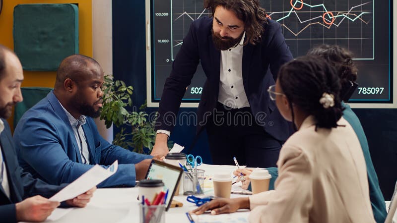 Startup Team Analyzing Success Metrics and Key Performance Indicators ...